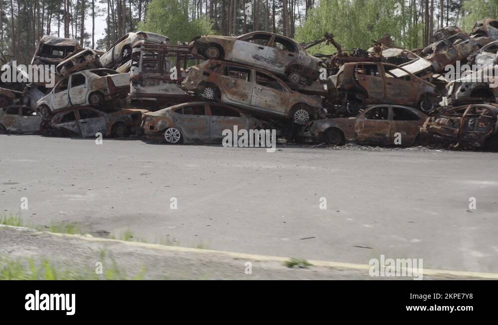 Destroyed cars of civilians. Cars cemetery. Aerial. Post-apocalypse ...
