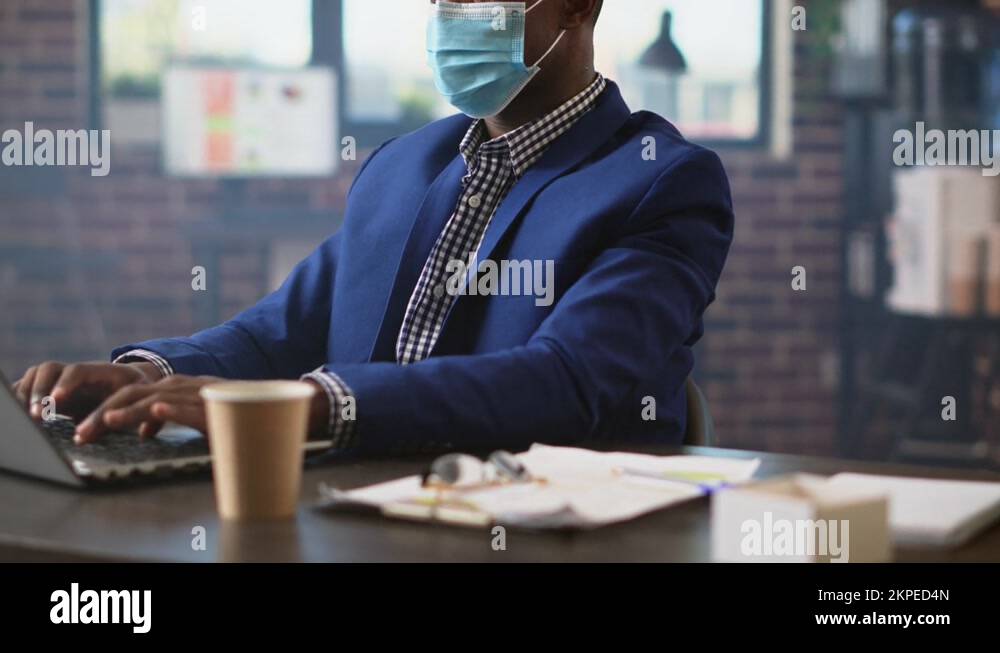 Portrait of office employee working on business strategy report Stock ...