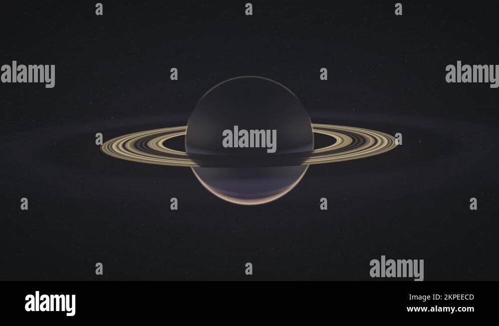 Backlit rings of planet Saturn, solar system. Slow zoom in ...