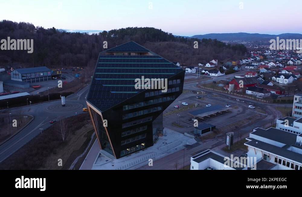 Rotating aerial overview of energy plus office building Powerhouse with ...