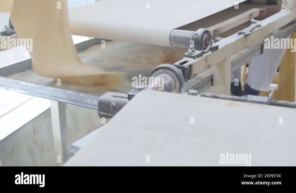 the process of baking national Armenian lavash from thin dough in a ...