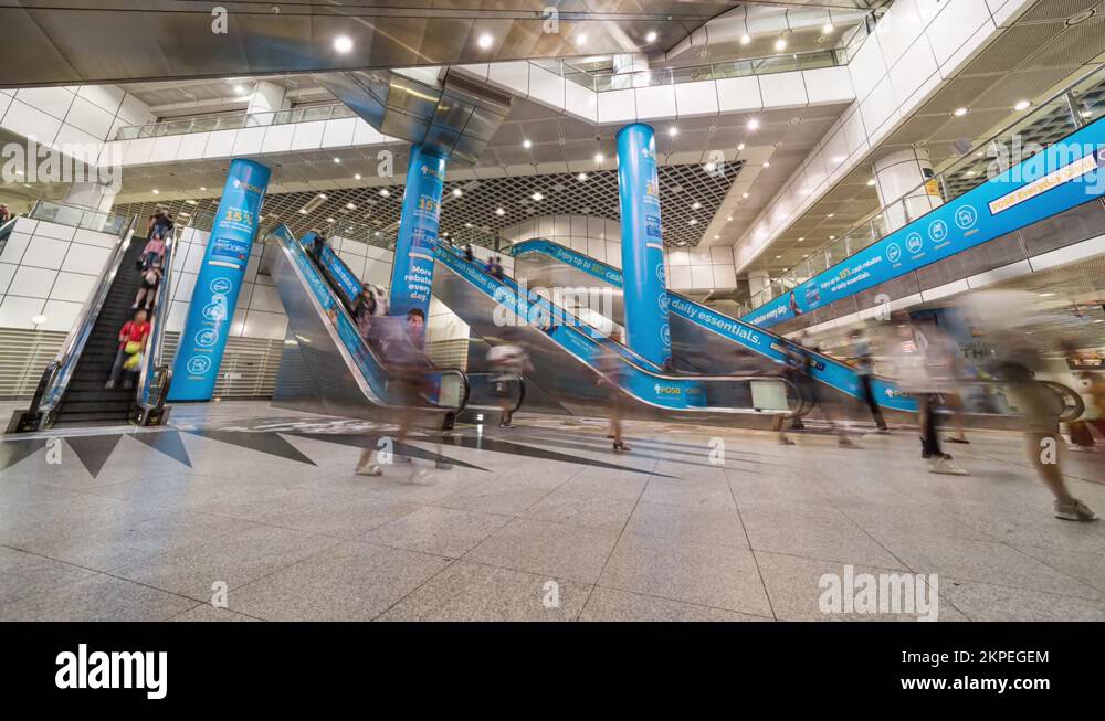 Time-lapse of Asian people walk use escalator at MRT subway station in ...