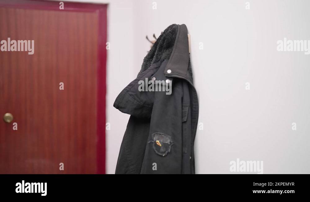 Coat hanged Stock Videos & Footage - HD and 4K Video Clips - Alamy