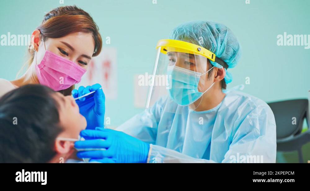 kid covid 19 rapid test Stock Video Footage - Alamy