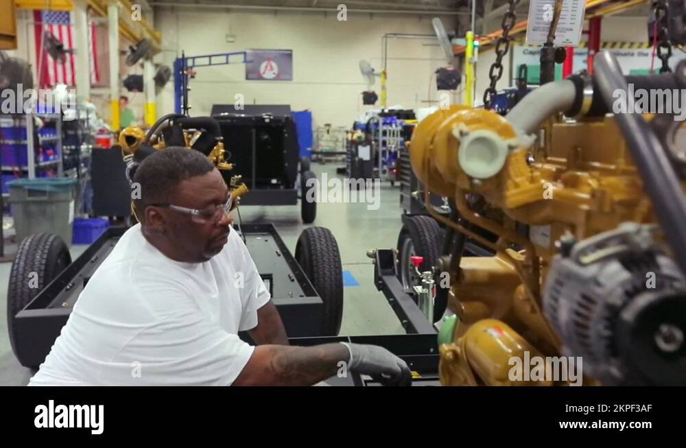 Worker building motor in factory Stock Videos & Footage - HD and 4K ...