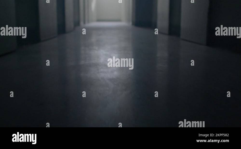 movement floor in dark corridor prison glare light in menacing floor ...