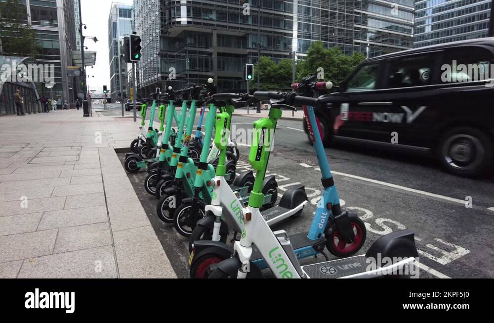 Row electric scooters parked Stock Videos & Footage - HD and 4K Video ...