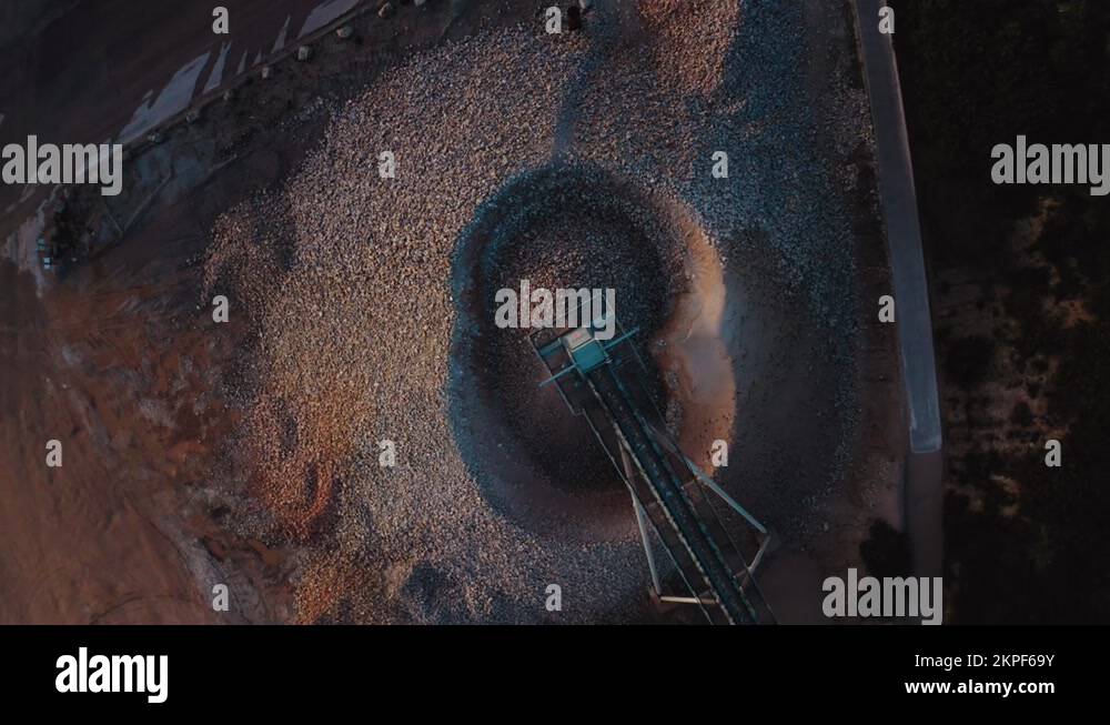 Bird's eye view over conveyor moving for production of construction ...