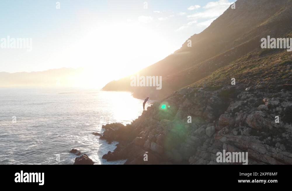 An extreme long shot where the camera is lowered and captures the sun's ...