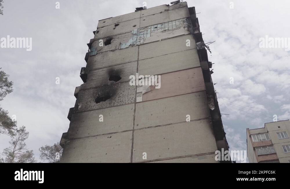 A bombed-out apartment building after an airstrike. War in Ukraine ...