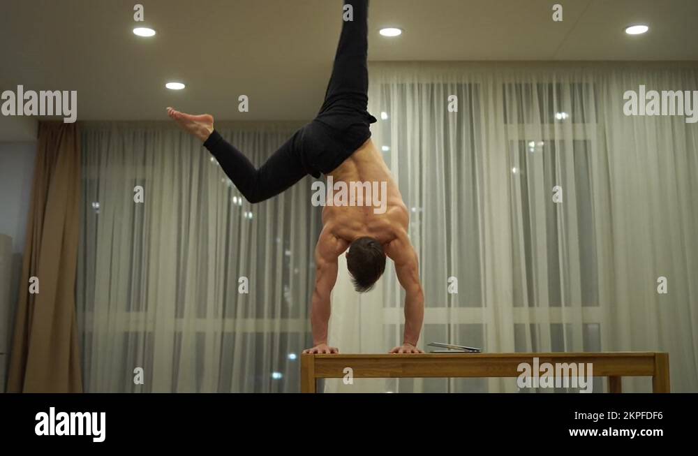 Gymnast man balance Stock Videos & Footage - HD and 4K Video Clips - Alamy