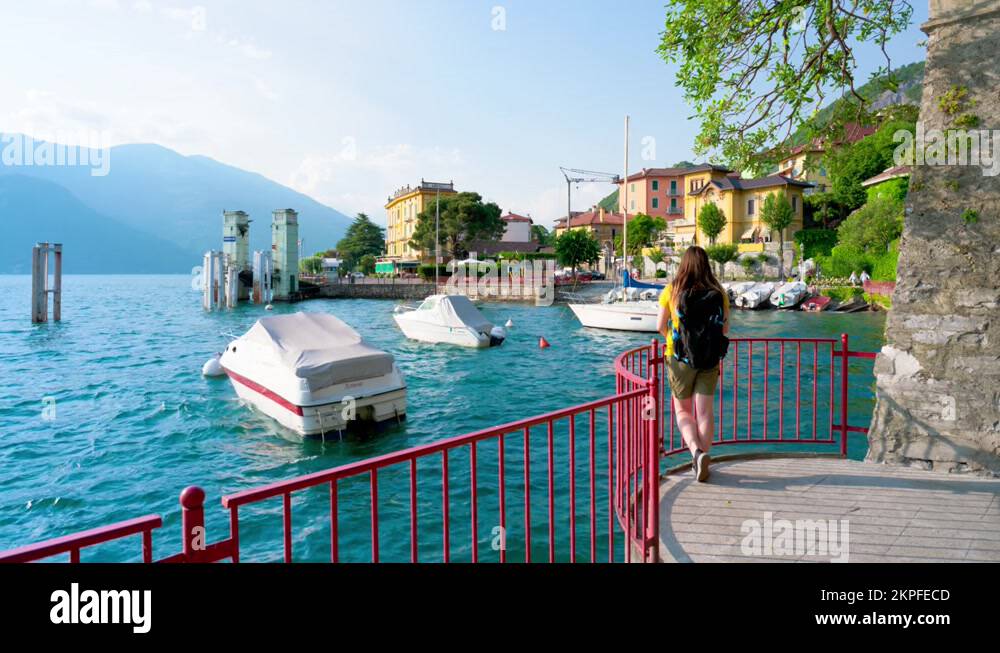 Beautiful blonde girl in Varenna, the Lombard village of lovers on Lake ...