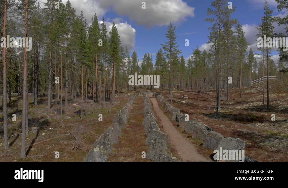 Moving through rows of WW 2 Anti-Tank Barriers. Low Drone Footage Stock ...