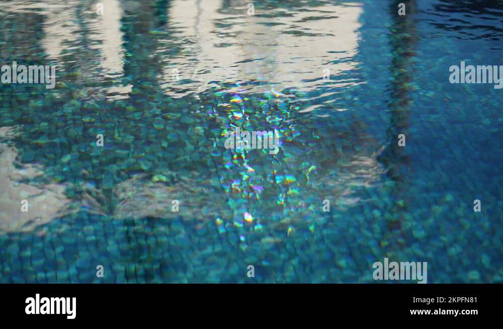 Surface of sunny clear transparent blue water in swimming pool Stock ...