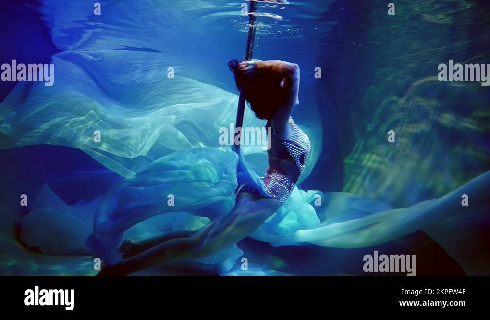 Pole dancer like a mermaid under water in an elegant dress Stock Video ...