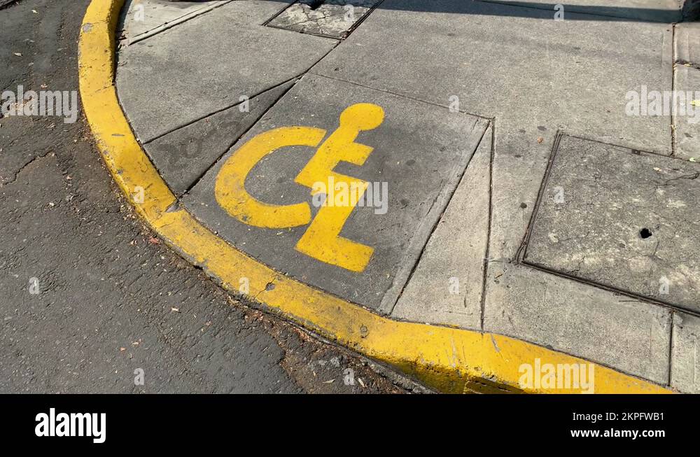 Yellow disabled sign Stock Videos & Footage - HD and 4K Video Clips - Alamy