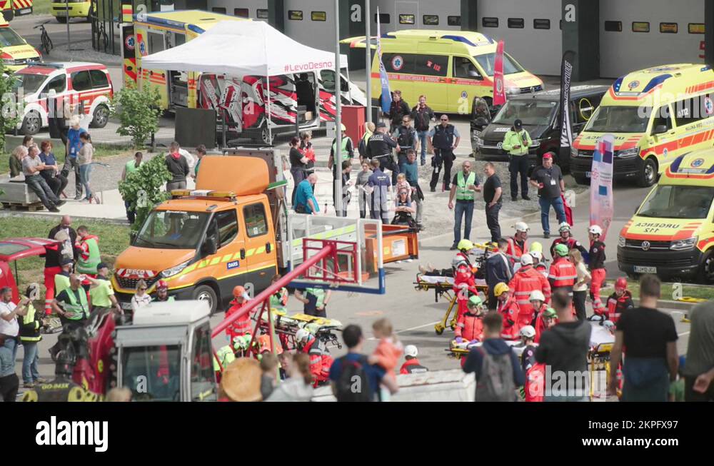 Paramedics event gathering surrounded with ambulance cars 4K Stock ...