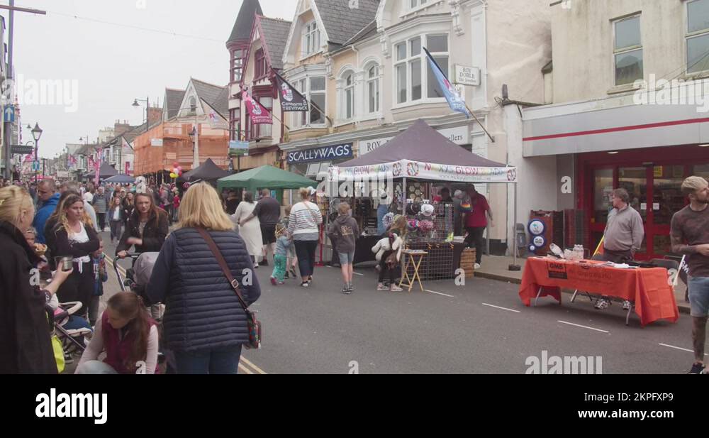 Stalls At The Sidewalk With Crowded People During Camborne Trevithick ...