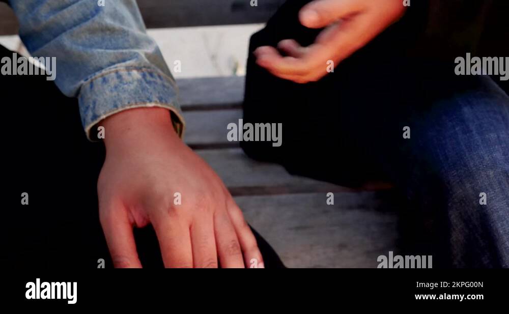 Female comforting male by holding and patting hands Stock Video Footage ...