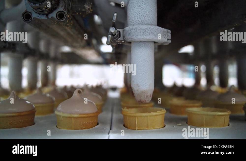 Ice Cream Production Line. Filling of Wafer Cups with Ice Cream. Ice ...