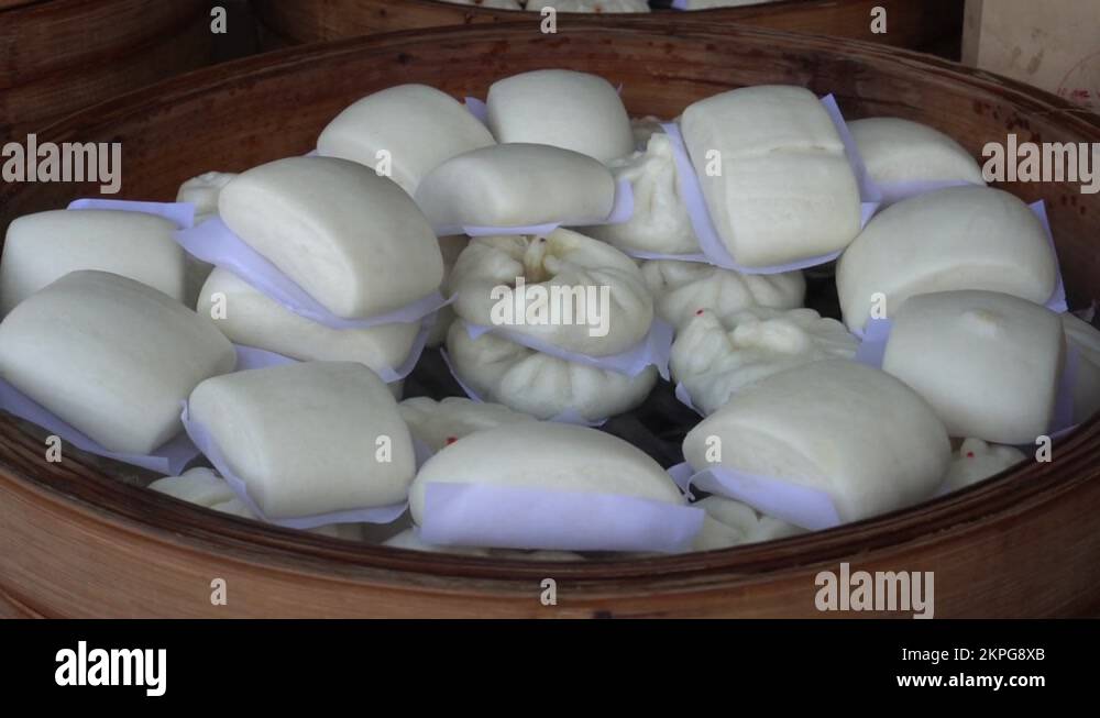 steaming bao dim sum bread bun in bamboo basket Stock Video Footage - Alamy