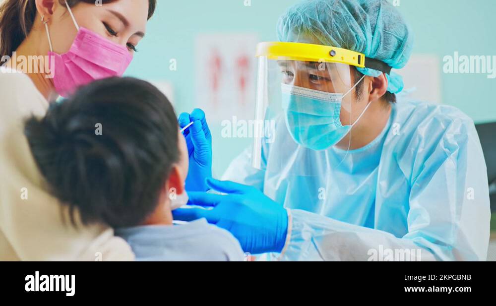 kid covid 19 rapid test Stock Video Footage - Alamy