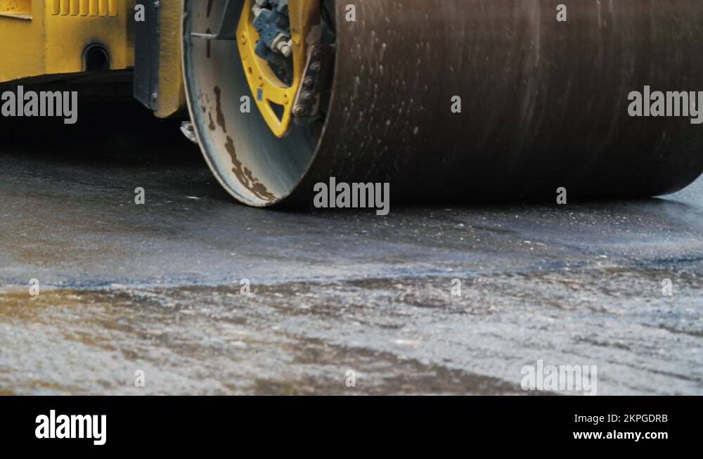 Two steamrollers leveling highway surface Stock Video Footage - Alamy