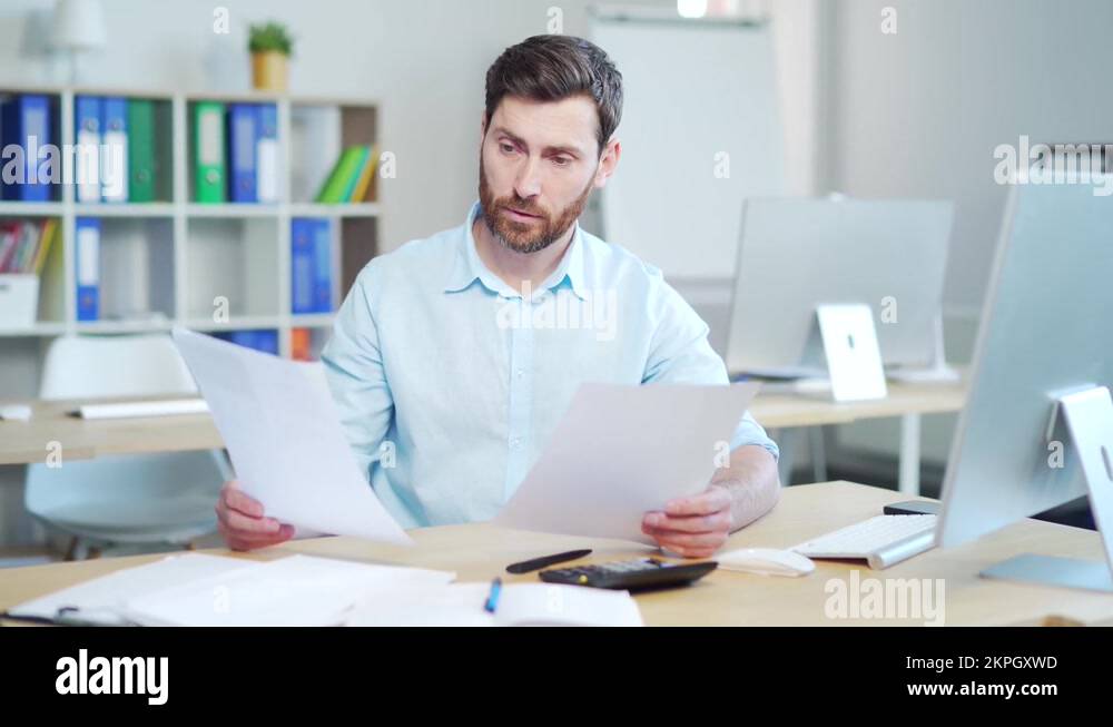 Difficult for a male employee to deal with paperwork. documents ...