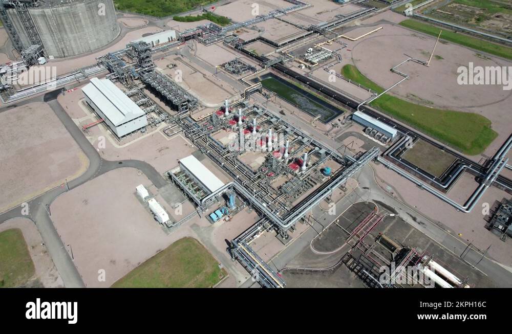 Pipework at National grid Grain LNG Terminal gas storage Kent UK drone ...