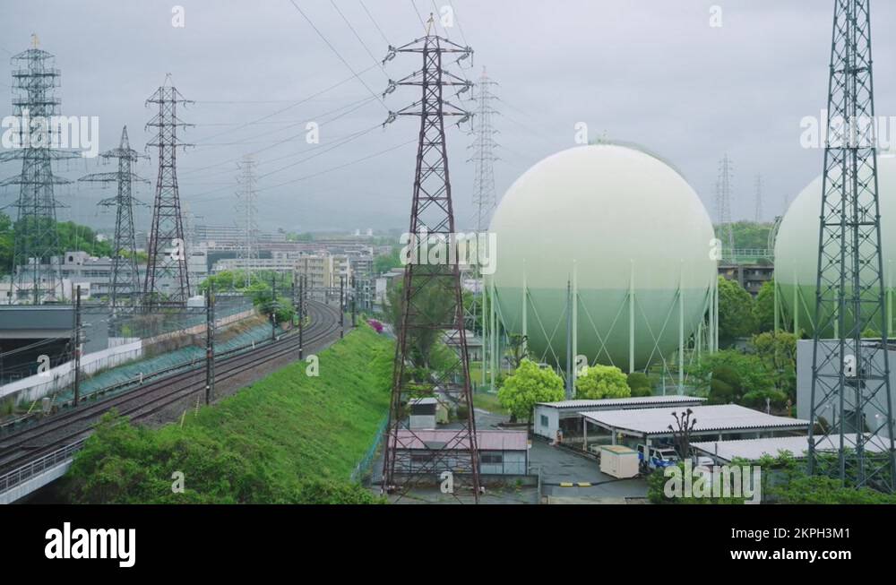 Gloomy industrial area, Power Lines and Gas Tanks in Osaka Japan Stock ...