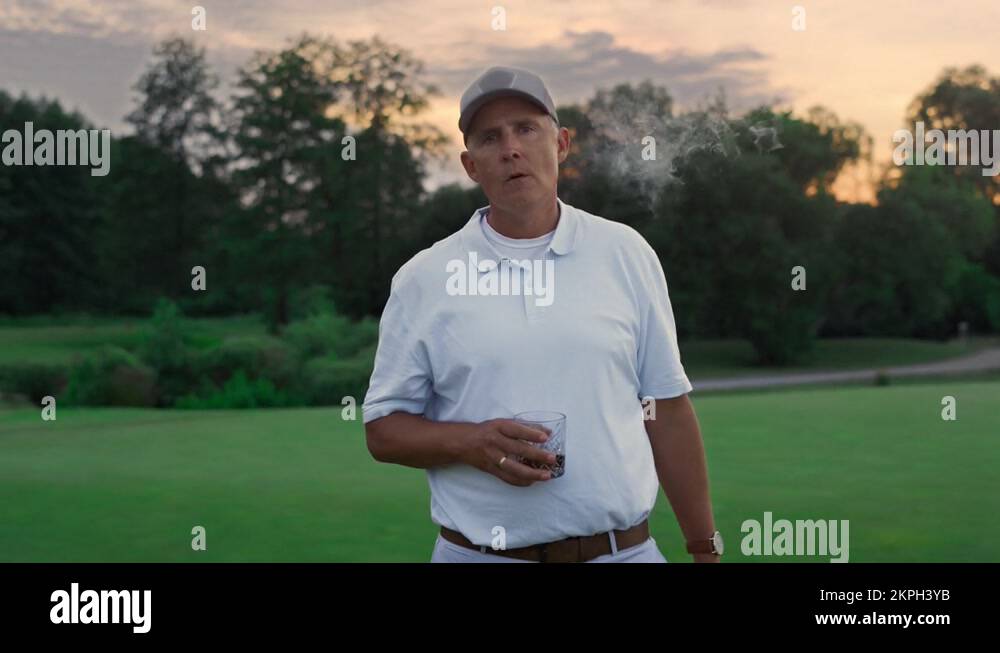 Rich golf player stand relaxed on course. Old man smoking cigar holding ...
