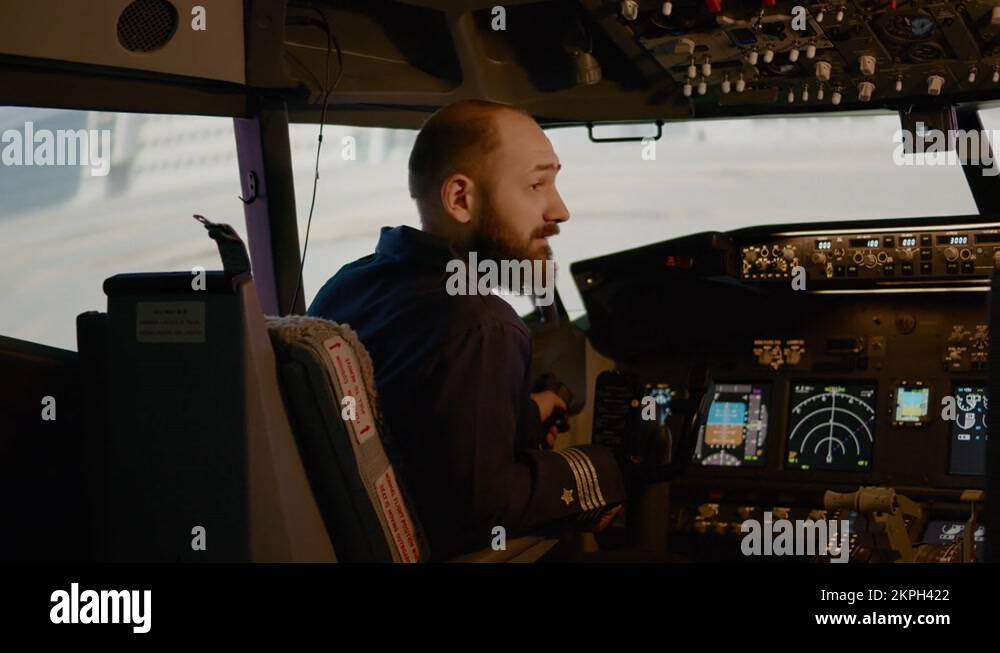 Portrait of airplane captain preparing to fly aircraft in cockpit Stock ...