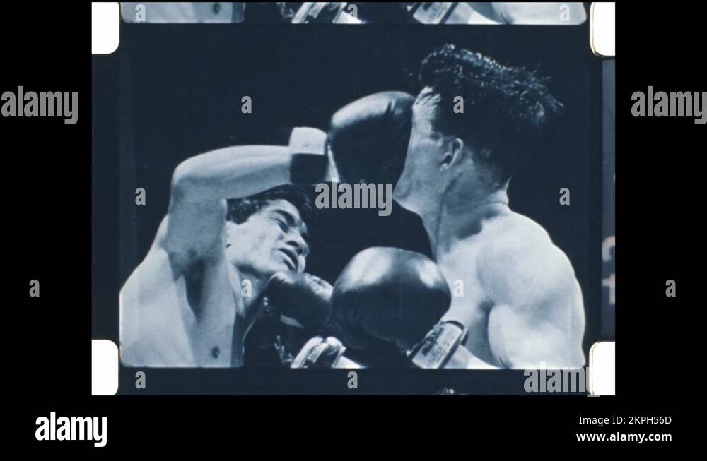 1970s: Still photos of boxing fights. Tilt up photo of injured boxer ...