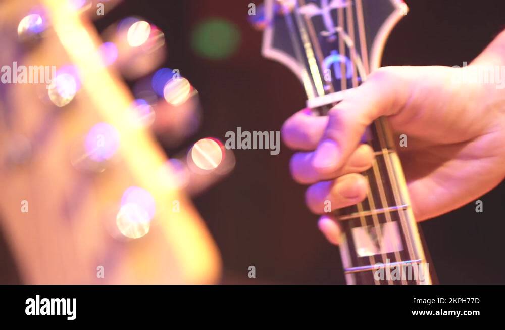 Hand grabbing electric guitar on stage. Close up Stock Video Footage ...