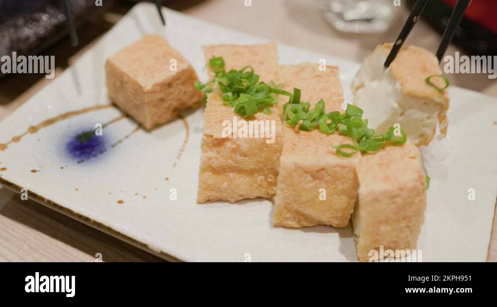 Tofu dish Stock Videos & Footage - HD and 4K Video Clips - Alamy