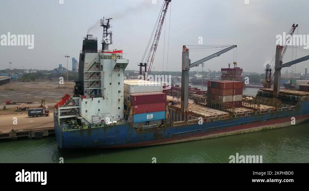 Loading Cargo Ship With Intermodal Containers At Mangalore Port In ...