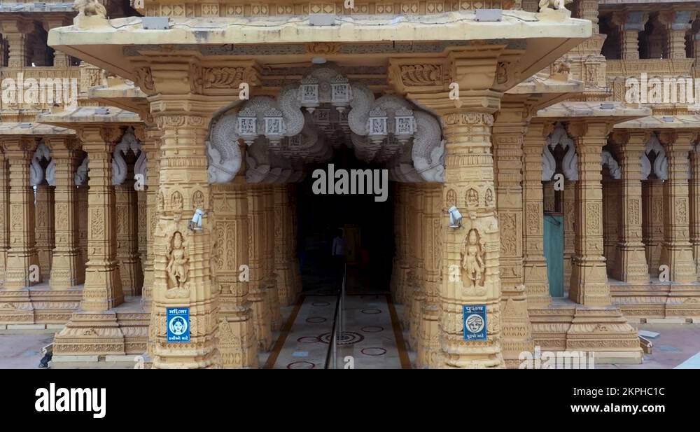 Entrance gate of the Somnath mandir with people visiting inside the ...