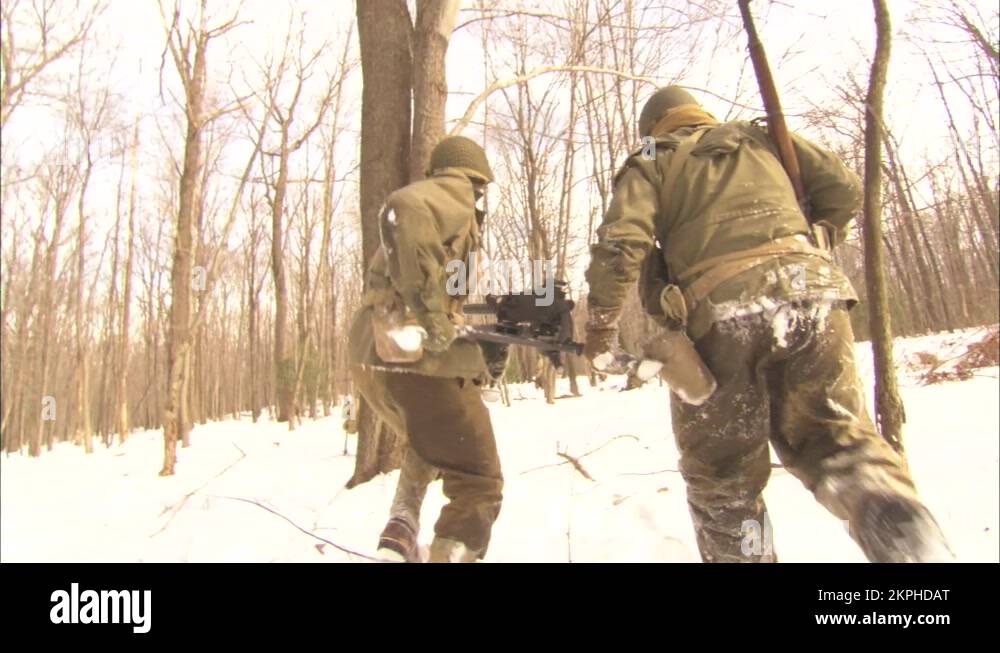 WW2 Battle of the Bulge recreation - machine gun in the snow Stock ...
