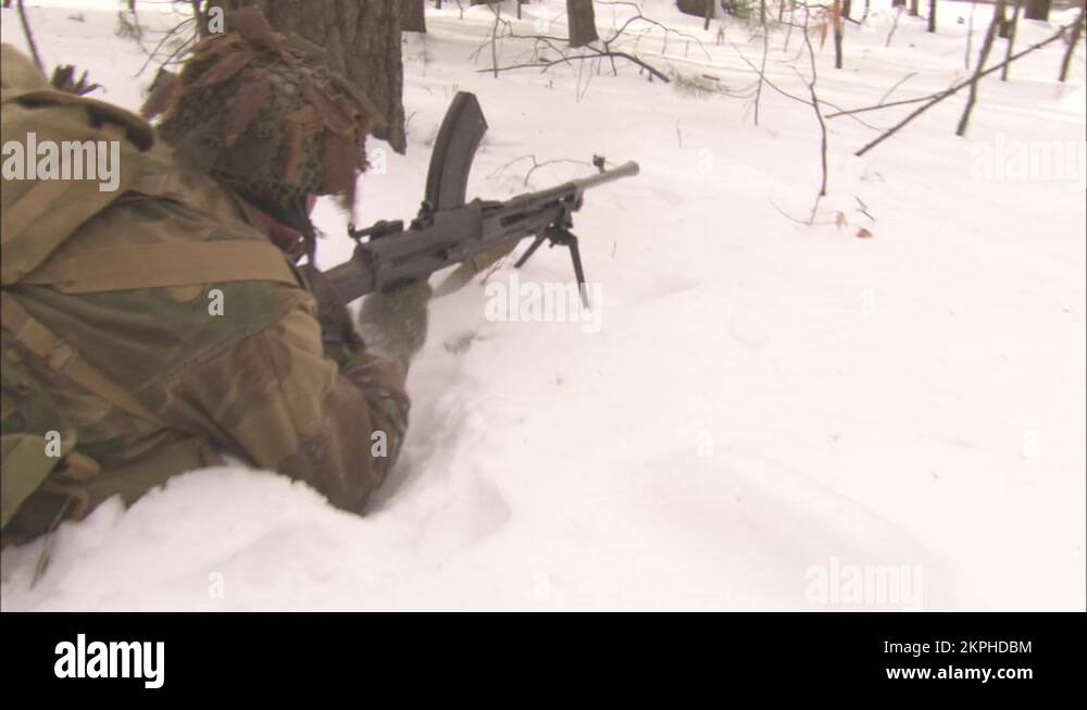 WW2 Battle of the Bulge recreation - British machine gunner Stock Video ...