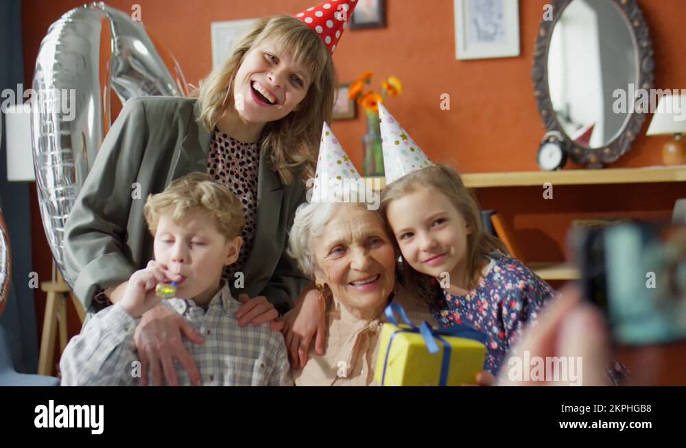 Happy Grandma Posing with Family for Photo on Birthday Party Stock ...