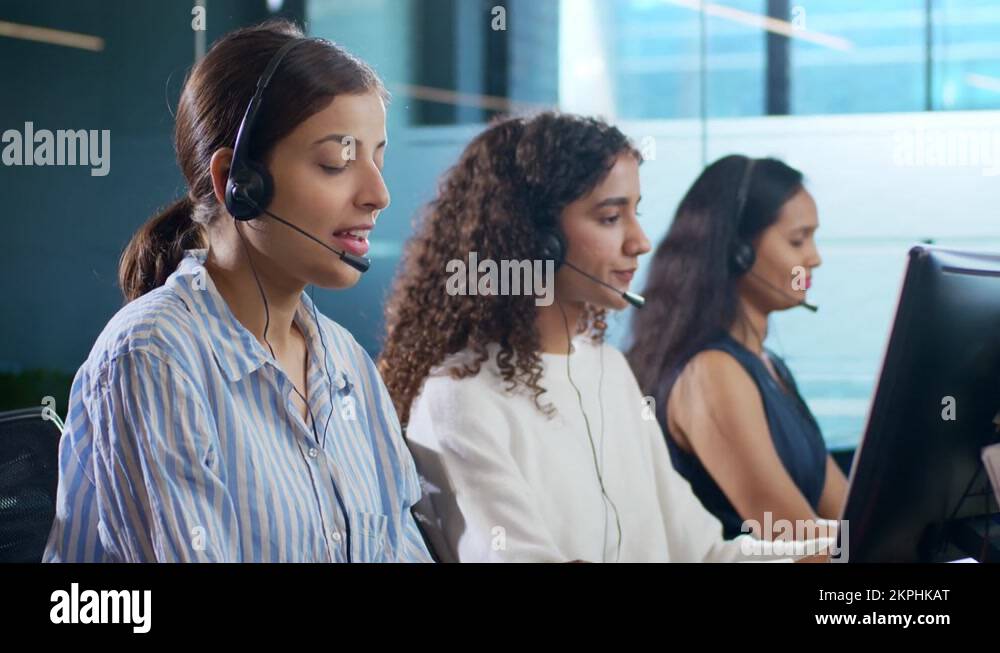 Indian women call center employees interacting with clients in ...