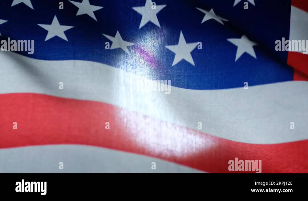Video of the half, Moon shines trough American USA flag waving on the ...