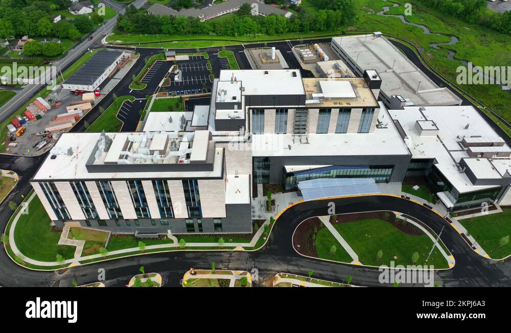 Modern American hospital building, new construction aerial reveal ...