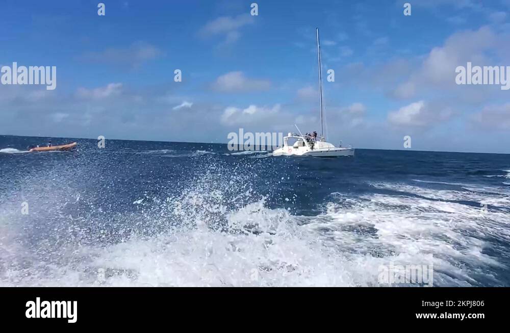 POV sail from boat splash water trail waves and sailboat, Caribbean Sea ...