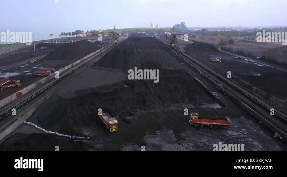 Trucks And Heavy Equipment At The Coal Terminal In Mangalore Port Stock ...
