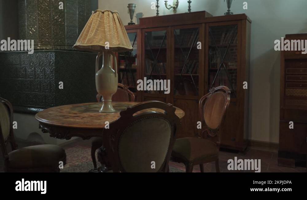 Antique 18th century living room with glass bookcase and wooden ...