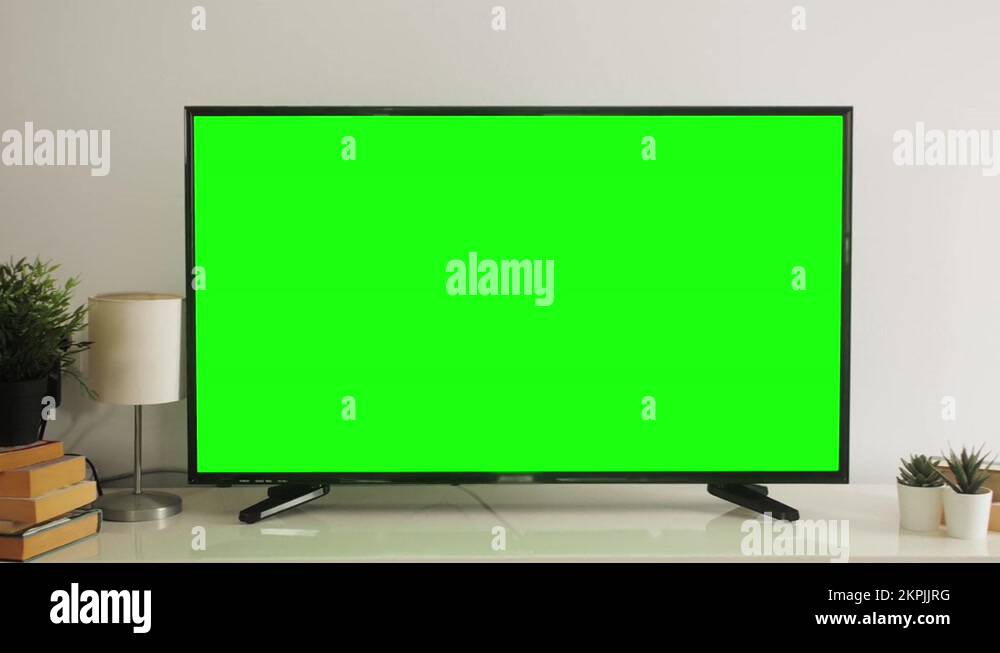 LSD smart TV screen with a blank green background in the living room ...