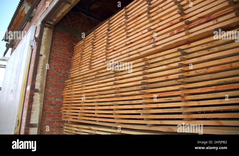 The pile of timber bricks stored in the warehouse Stock Video Footage ...