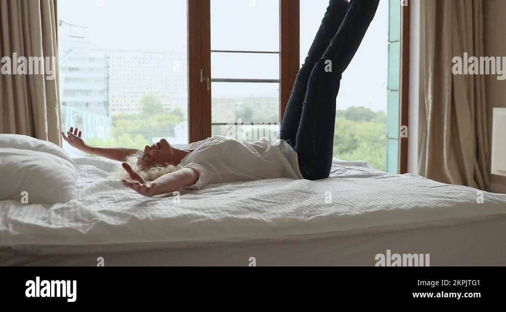 Bed raised arms woman Stock Videos & Footage - HD and 4K Video Clips ...