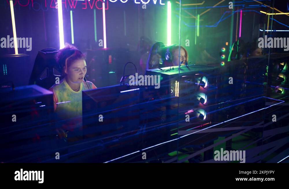 Gamer girls having fun after successful match win at computer gaming ...